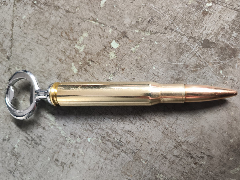 CAMOSTORE - FLASCHENÖFFNER Kaliber .50 BMG PATRONE NATO